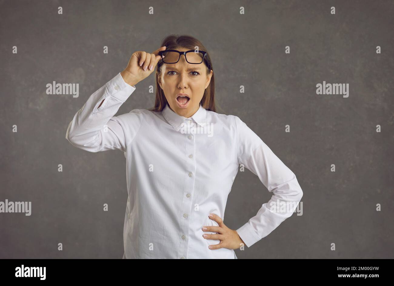 Woman takes off glasses and says WTF with expression of perplexion, shock and incredulity on ...