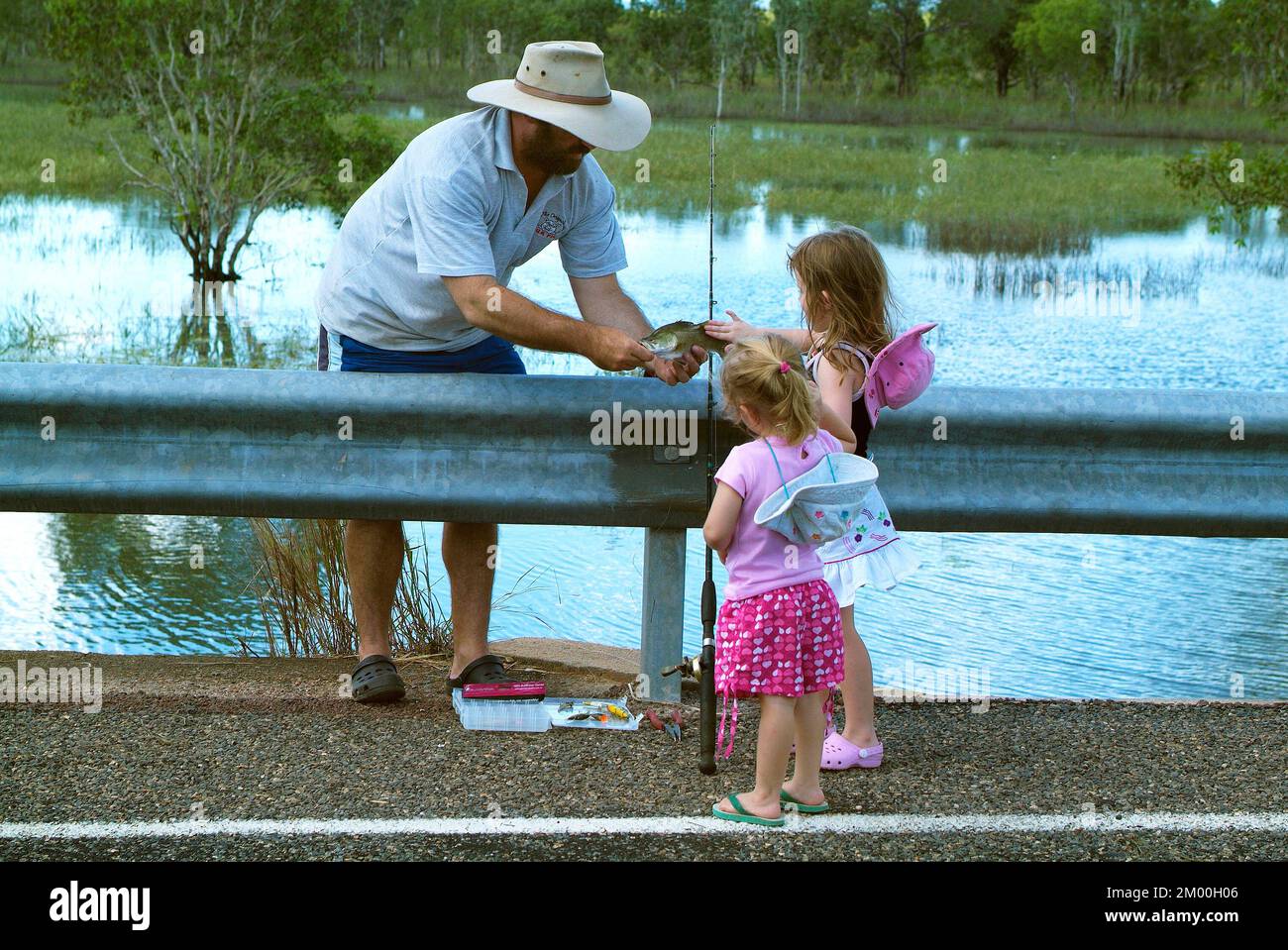 Jabiru, NT, Australia - April 24, 2010: Unidentified fisherman shows ...