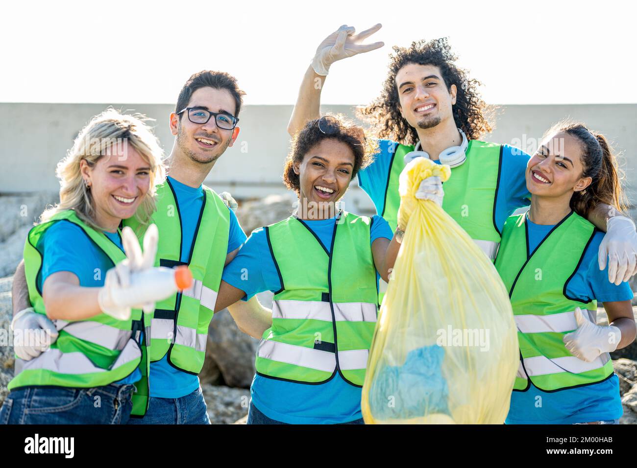 Group activists people smiling at the camera, satisfaction of a ...