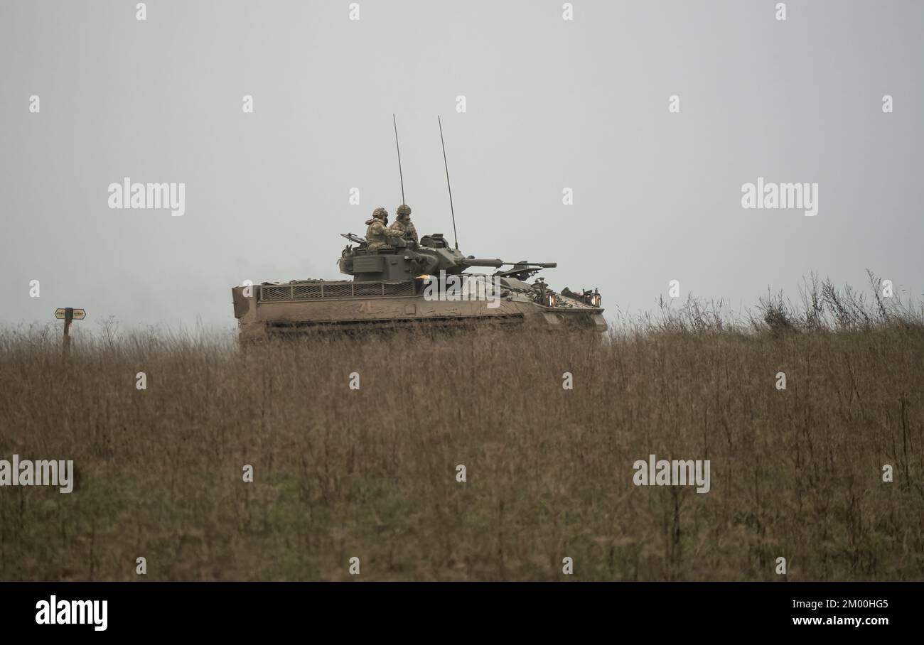 British army Warrior FV510 infantry fighting vehicle in action on a ...