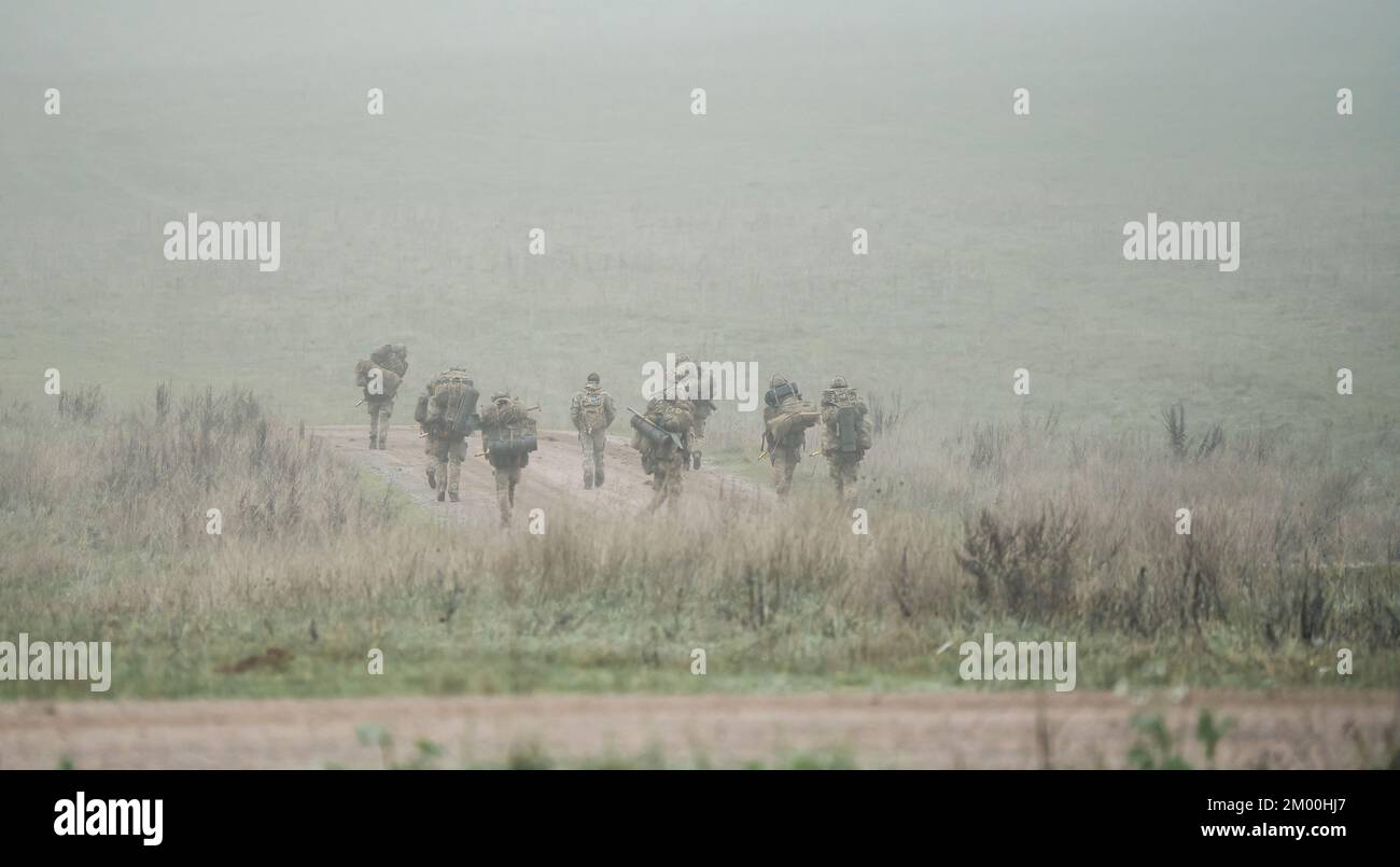 a unit of British army soldiers on a 40kg loaded march tab military ...