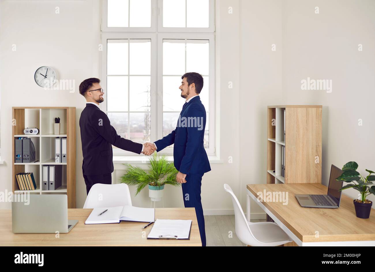 Business people greeting in office hi-res stock photography and images ...