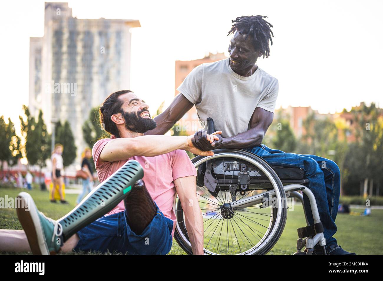 Two friends who have different physical disabilities greet each other ...