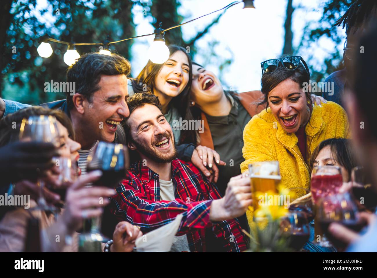 Big group of happy friends having fun at celebration party, mixed age ...