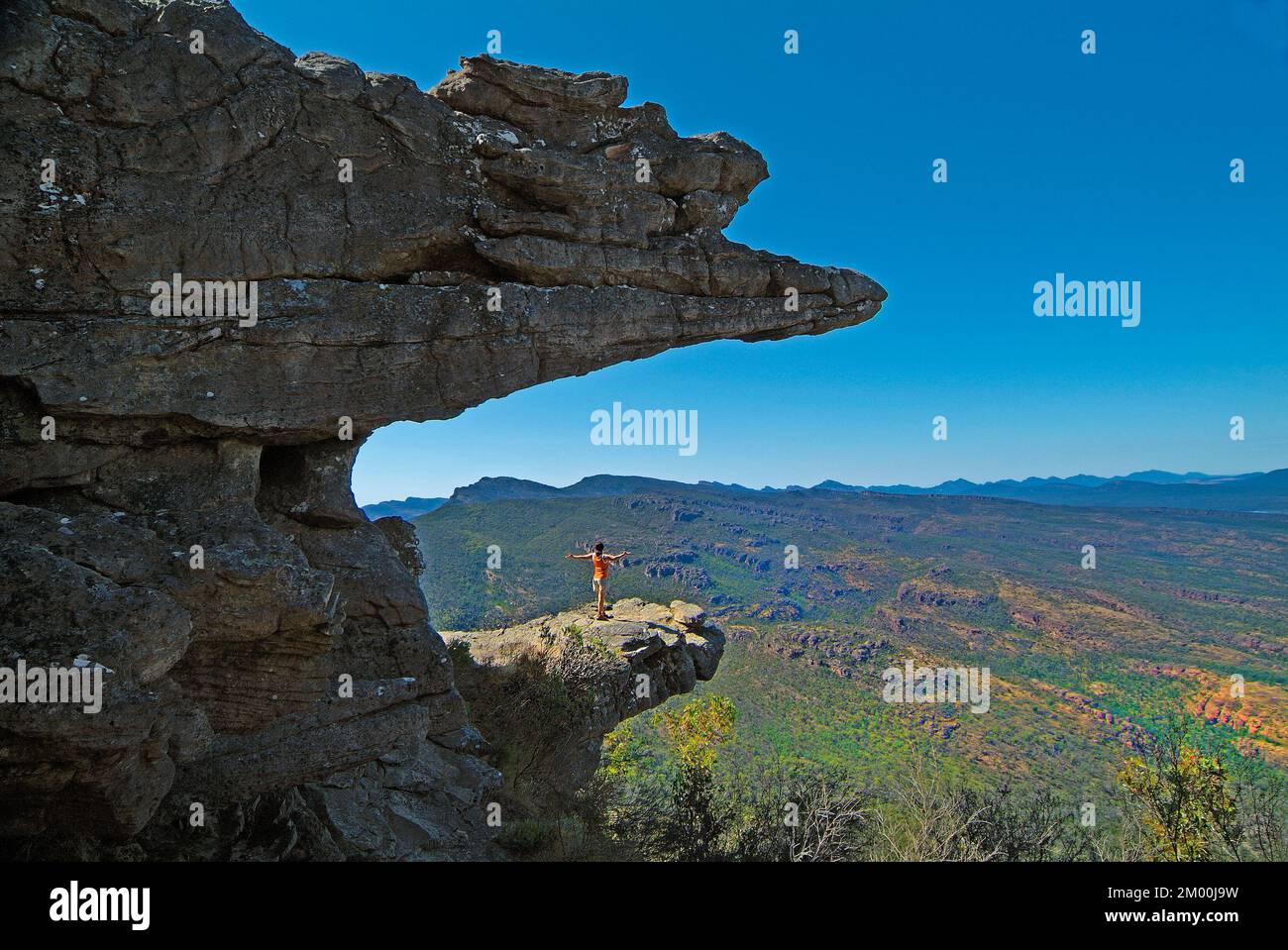 Australia, woman on rock formation named The Balconies in Grampians ...
