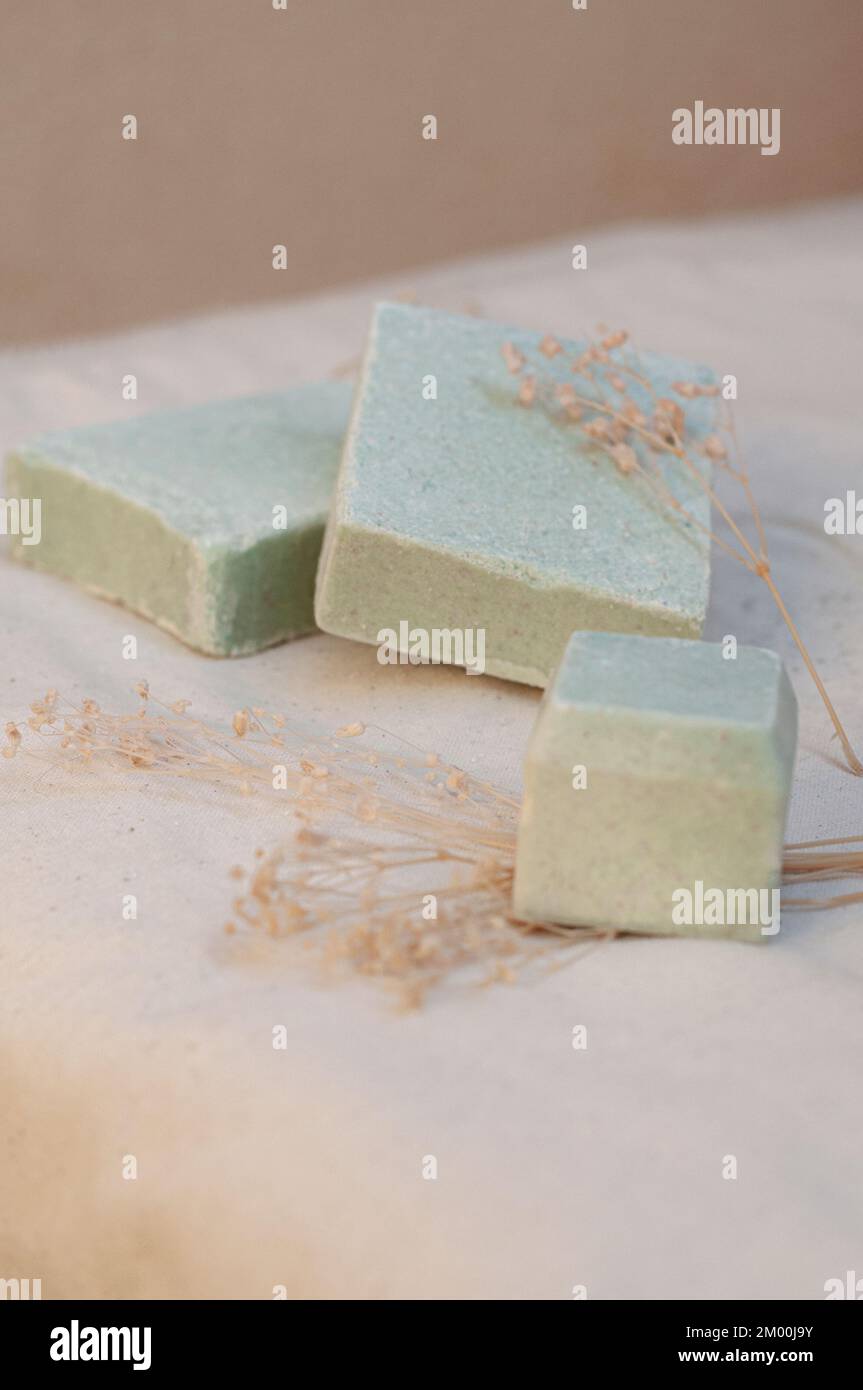 Himalayan salt blue soap bar with dry flowers Stock Photo - Alamy