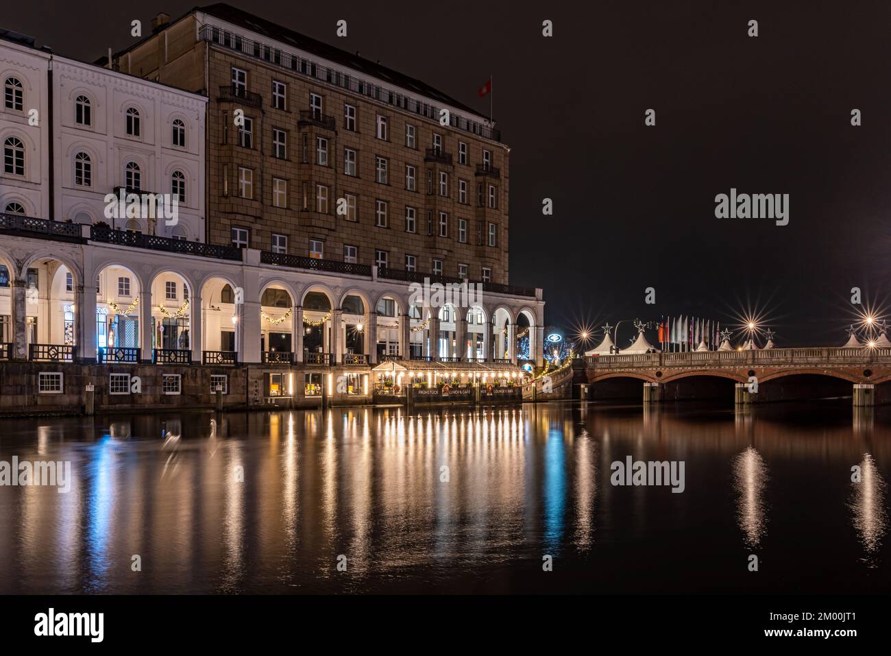 Hamburg, Germany - 11 27 2022: night shot of the hamburg alsterarkaden ...