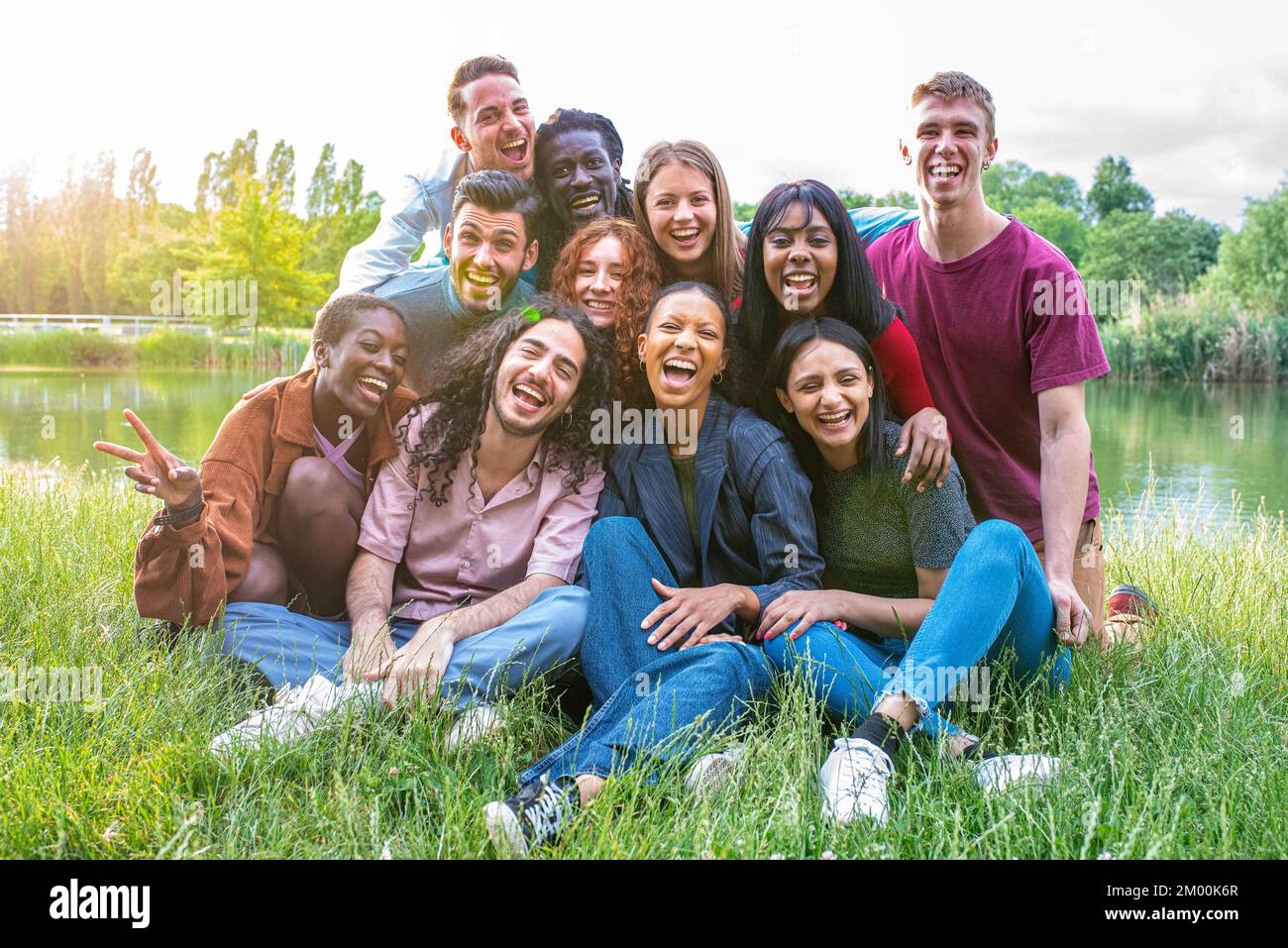 Young friends from diverse cultures and races posing for portrait ...