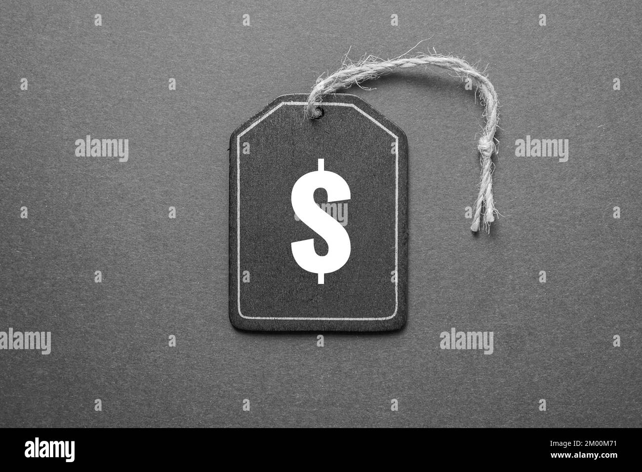 black price tag with dollar sign on the black background, black mockup ...
