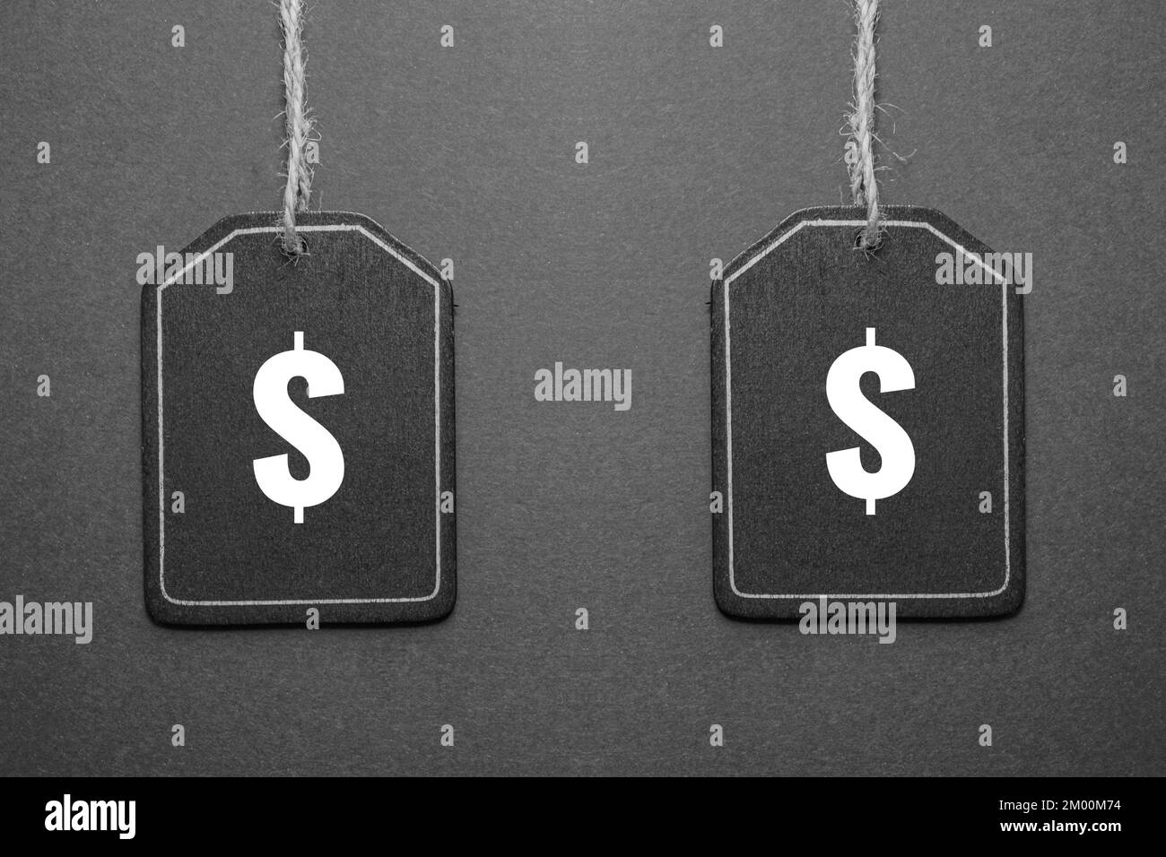 black price tag with dollar sign on the black background, black mockup ...