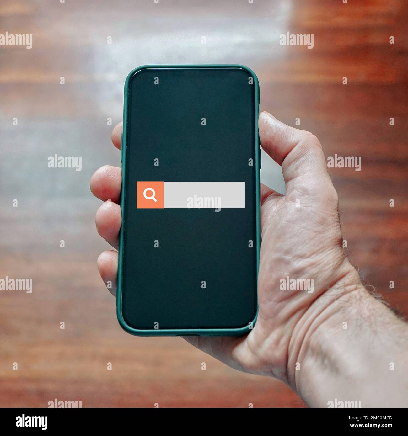 hand holding a smart phone searching on internet Stock Photo - Alamy