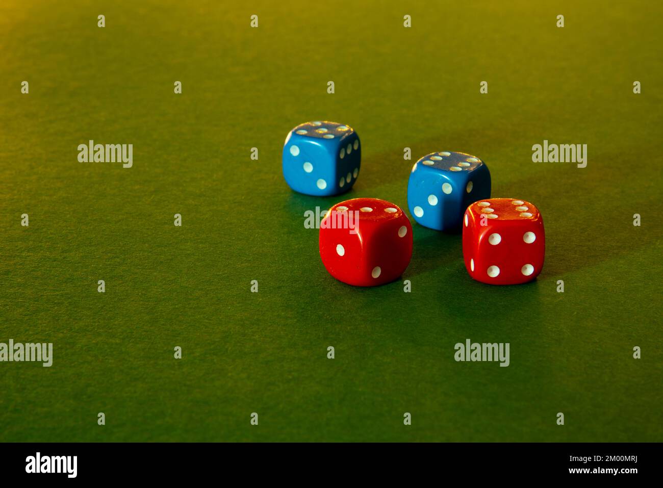 Den Helder, Netherlands. November 2022. Dice on a green background ...