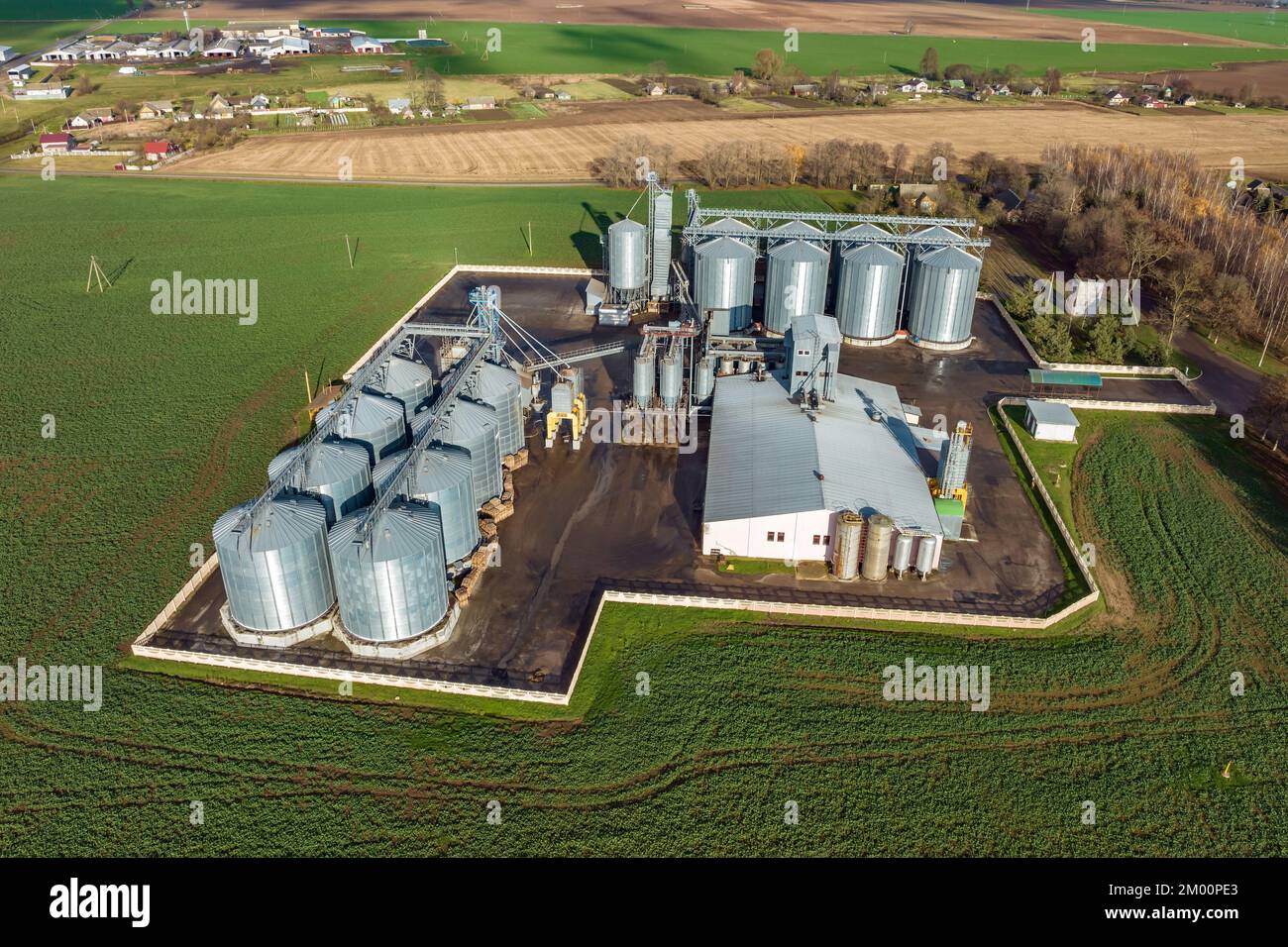 aerial view of a huge agro-industrial complex with silos and grain ...