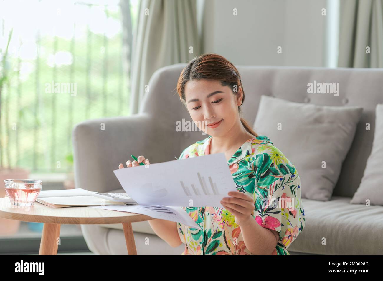 Chinese girl doing homework table hi-res stock photography and images ...