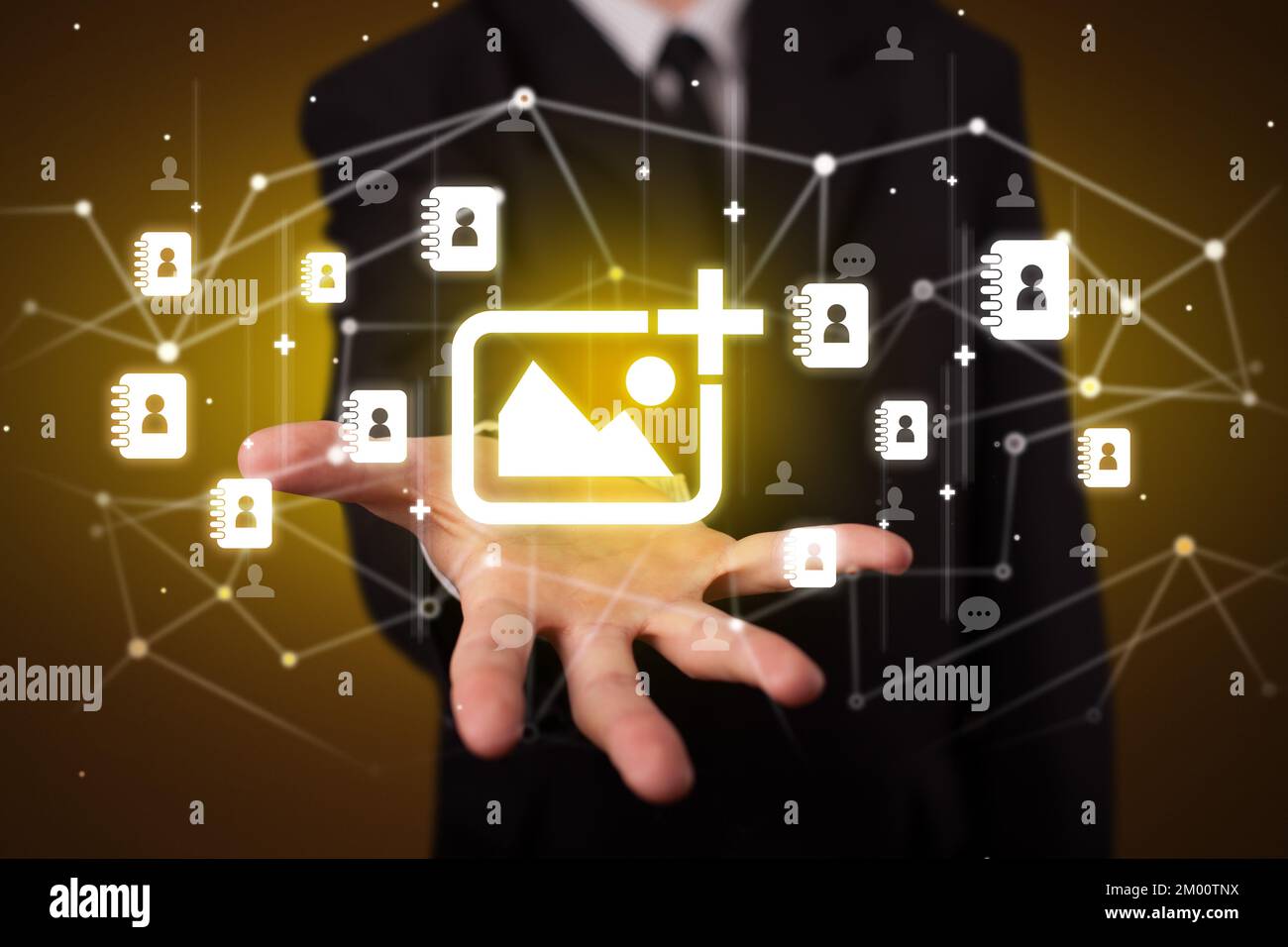 Hand holding social media icons Stock Photo - Alamy