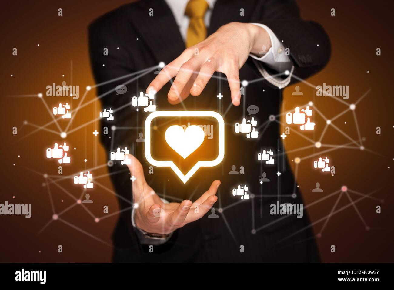 Hand holding social media icons Stock Photo - Alamy