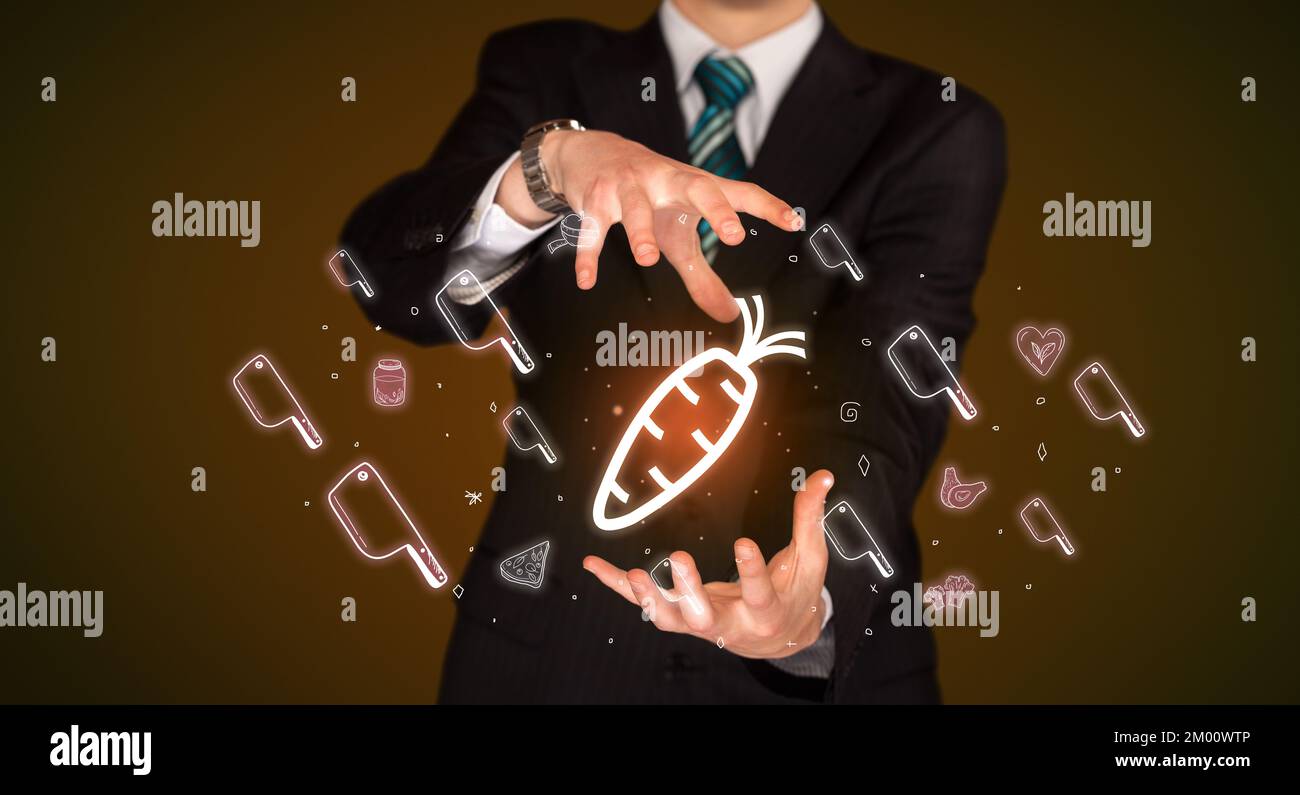 Hand holding food related icons Stock Photo - Alamy