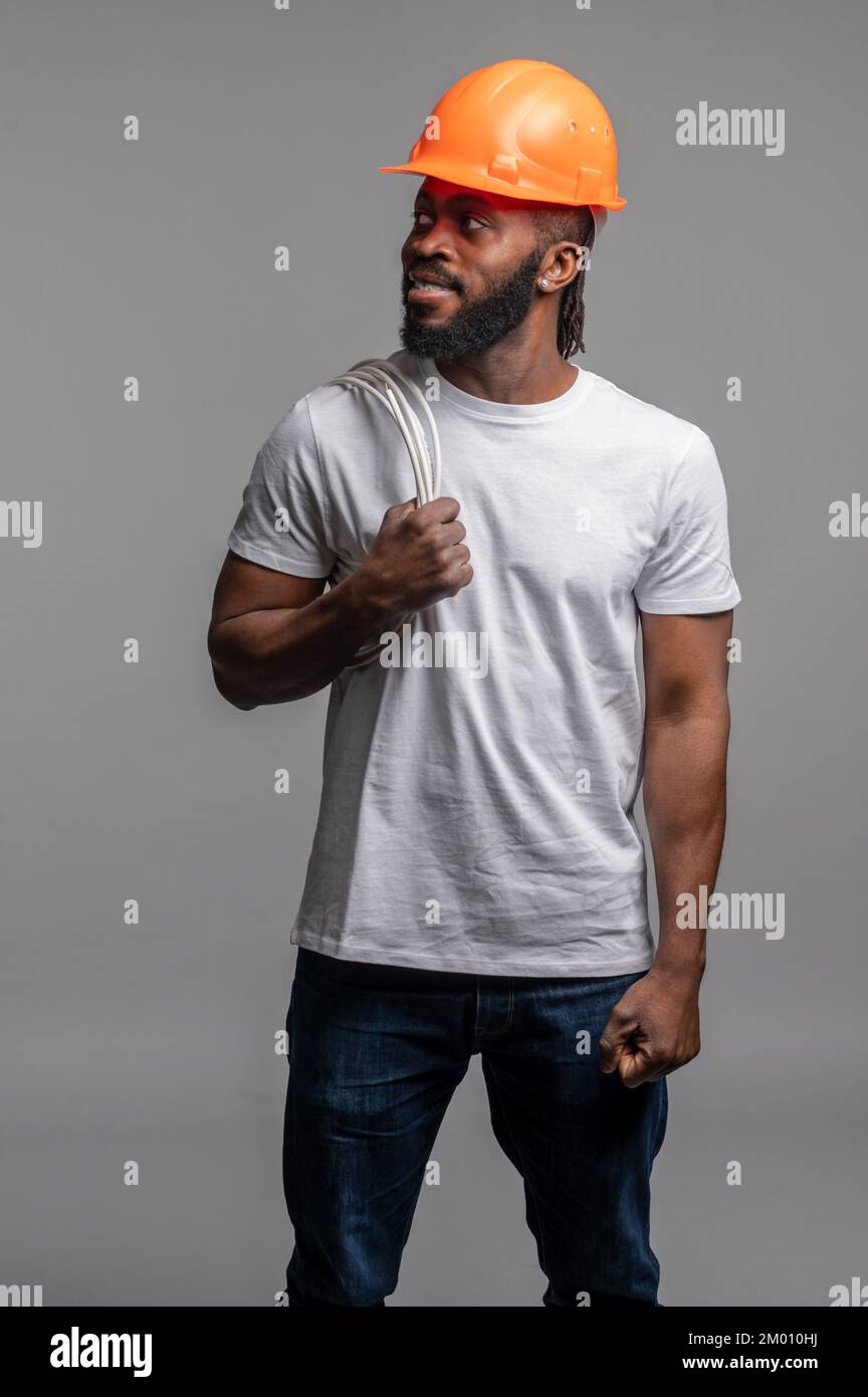 Man looking over shoulder dark hi-res stock photography and images - Alamy