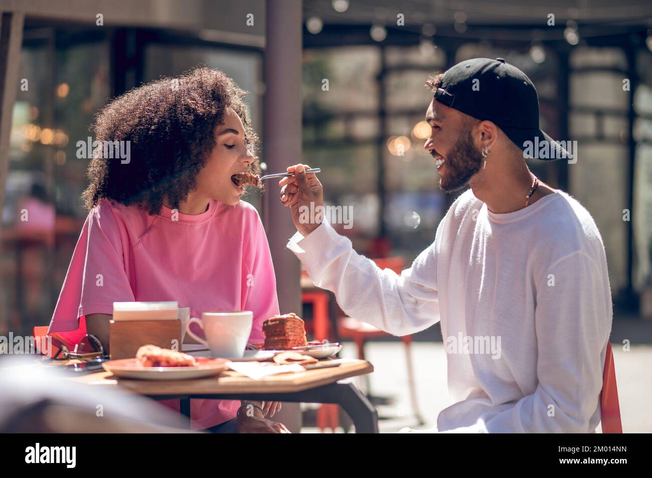 Feeding each other hi-res stock photography and images - Alamy