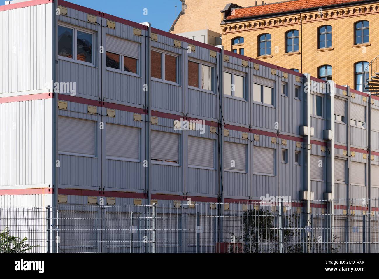 Office containers on several floors Stock Photo - Alamy