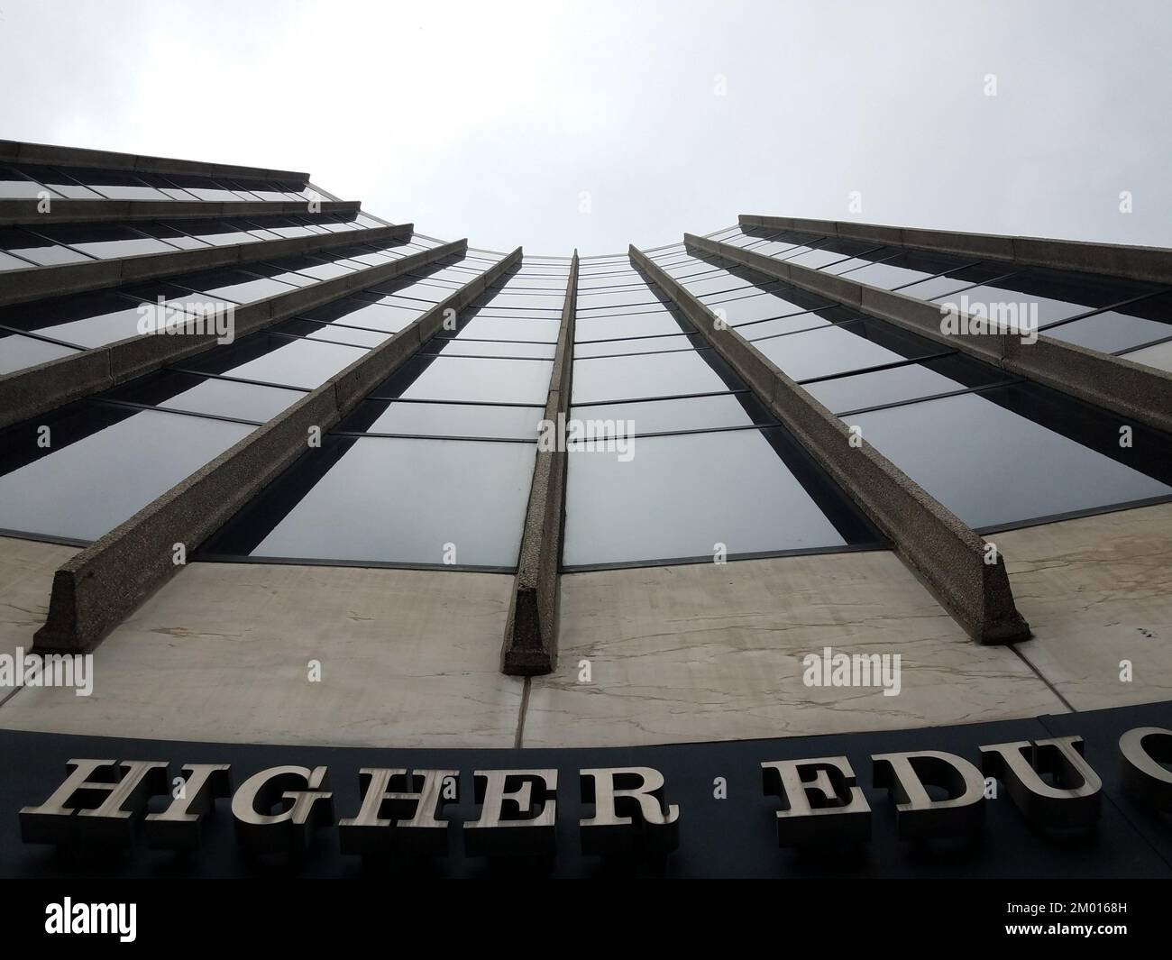 looking up at tall higher education building skyscraper windows Stock ...
