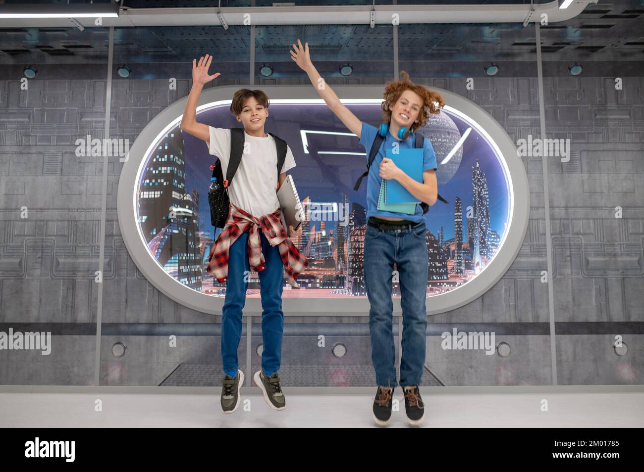 Two boys looking at computer hi-res stock photography and images - Alamy
