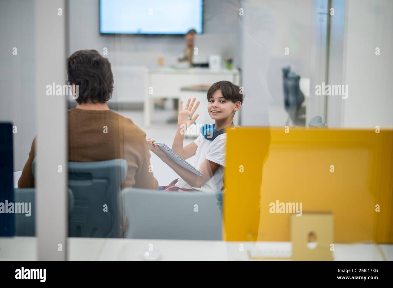 Conversation. A school teacher talking to his student Stock Photo - Alamy Conversation. A school teacher talking to his student Stock Photo - Alamy