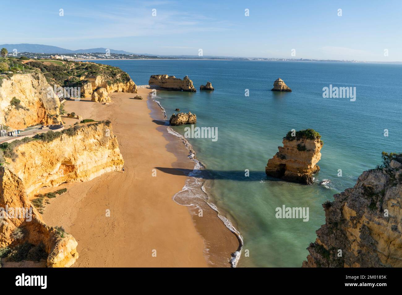 Praia Dona Ana beach with turquoise sea water ocean and cliffs ...
