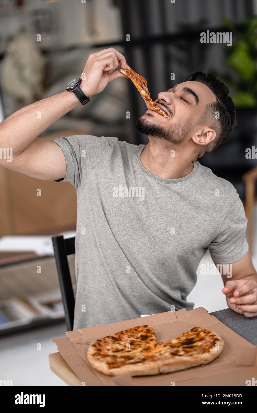 Man biting table hi-res stock photography and images - Alamy
