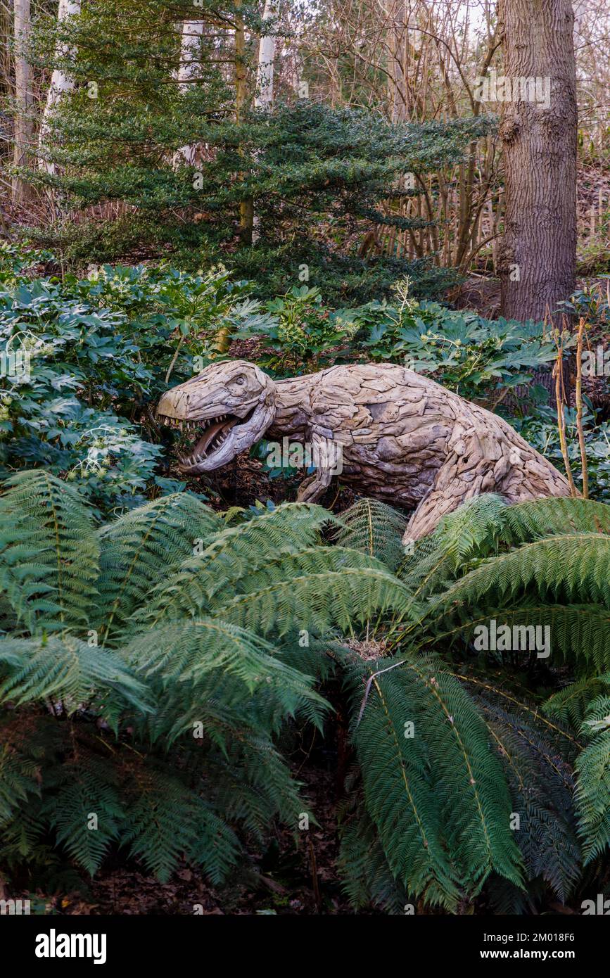 A wooden sculpture of Cretaceous dinosaur Tyrannosaurus Rex in ...