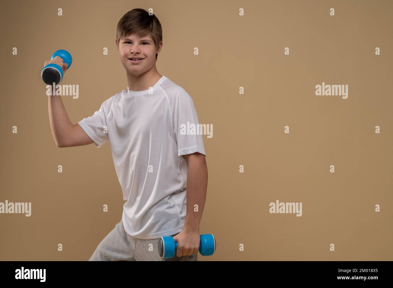 Child muscle arm hi-res stock photography and images - Alamy