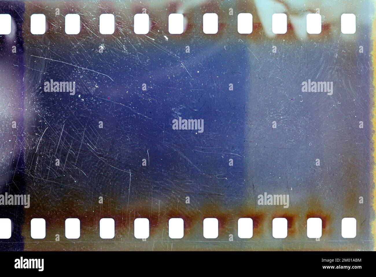 Dusty and grungy 35mm film texture or surface. Perforated scratched ...