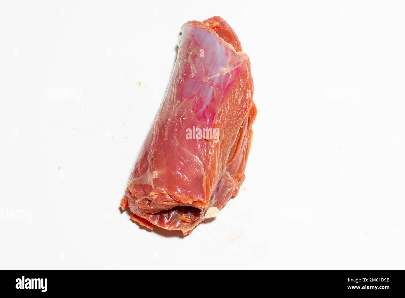 Fresh raw beef steak on a white background. A large piece of buffalo ...