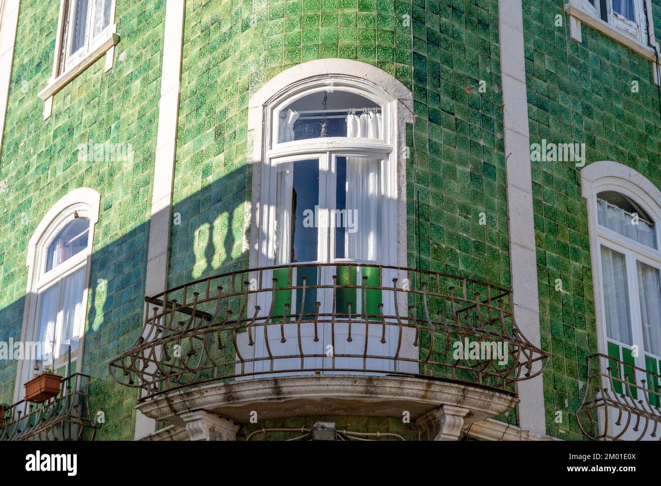 Green tiled building in Luis de Camoes square in the historic center of ...