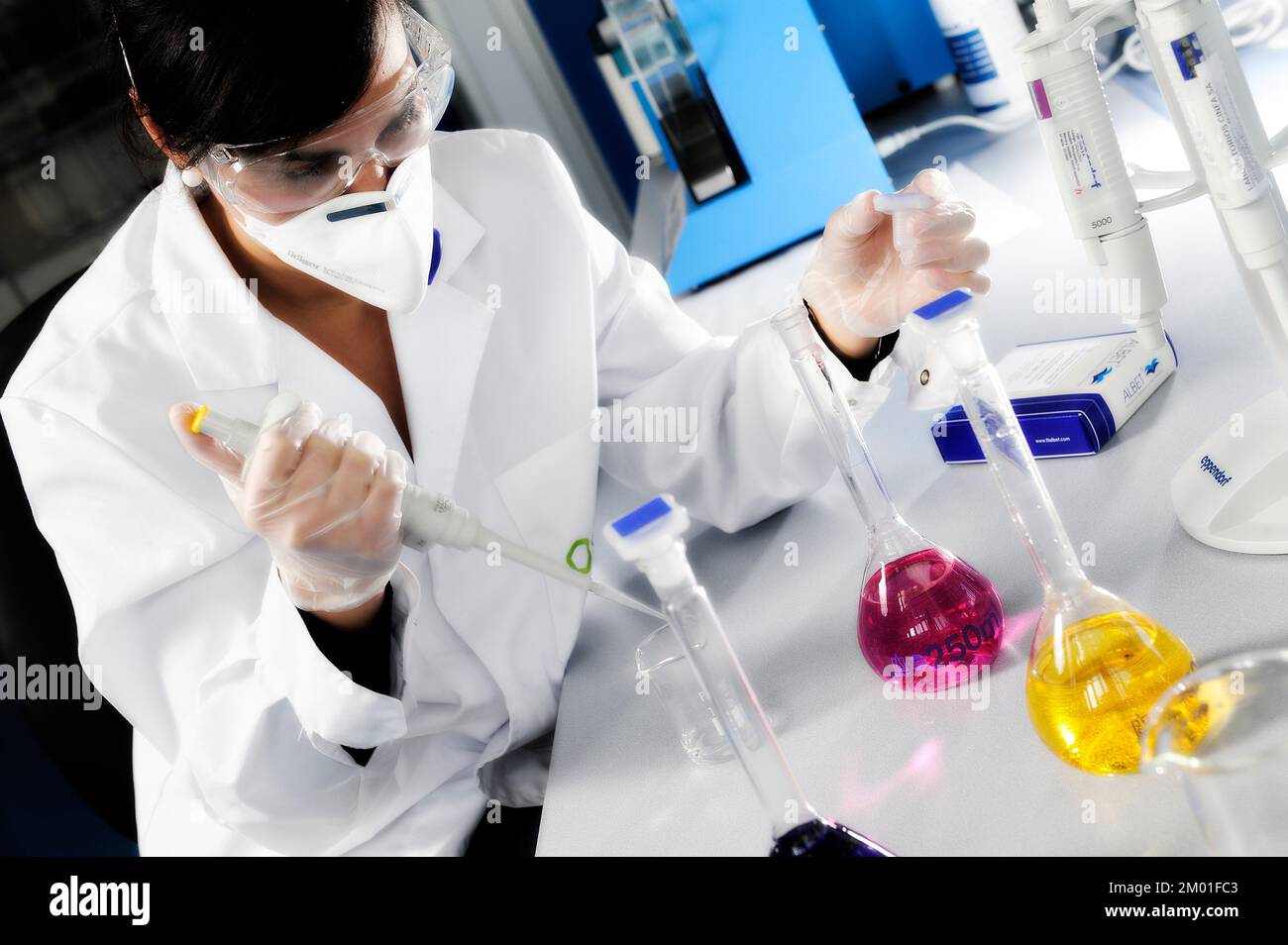 Laboratory technician working with test tubes Stock Photo - Alamy