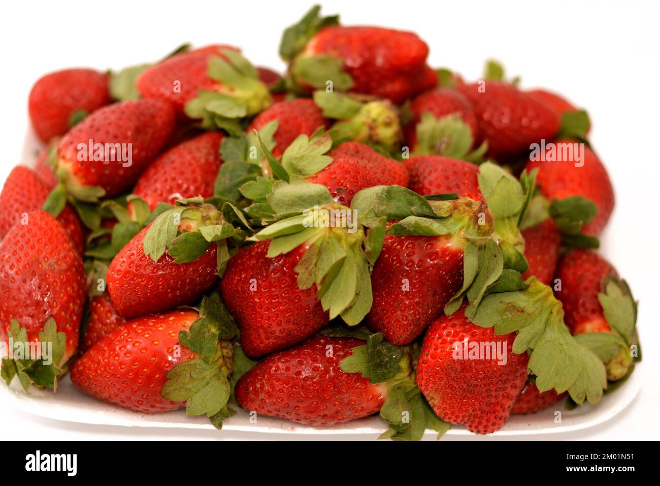 Pile of fresh strawberries fruit, the garden strawberry is a widely ...