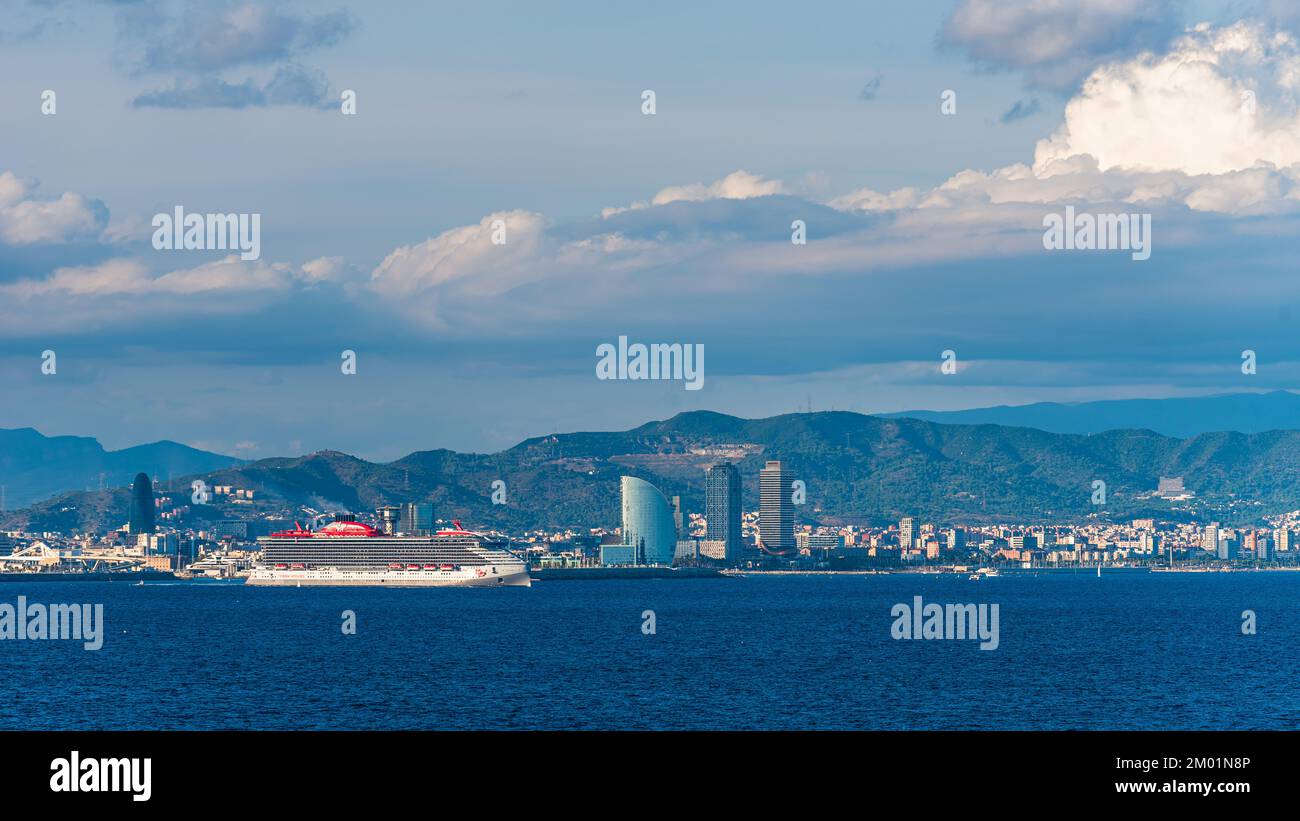 Valiant Lady - Virgin Voyages Cruise Ship at sea with Barcelona in the ...