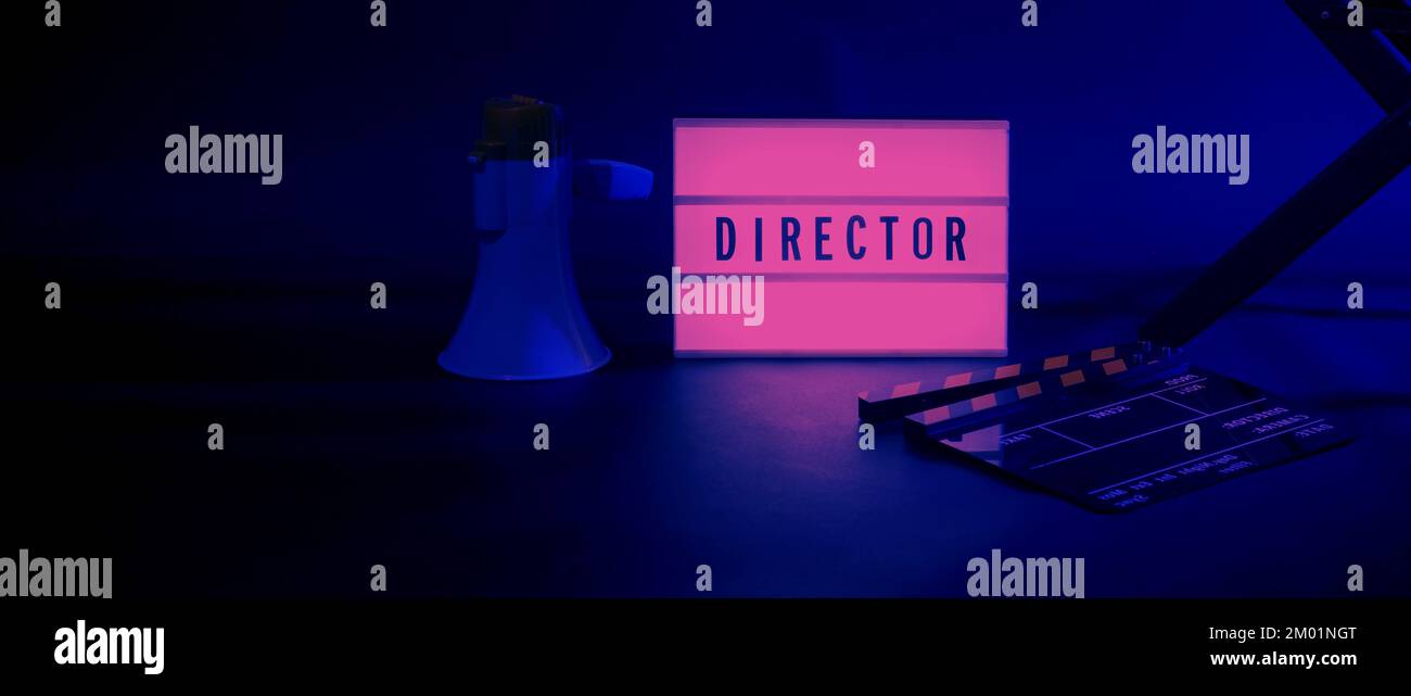 Director chair with cinema lightbox sign Director text on it and ...
