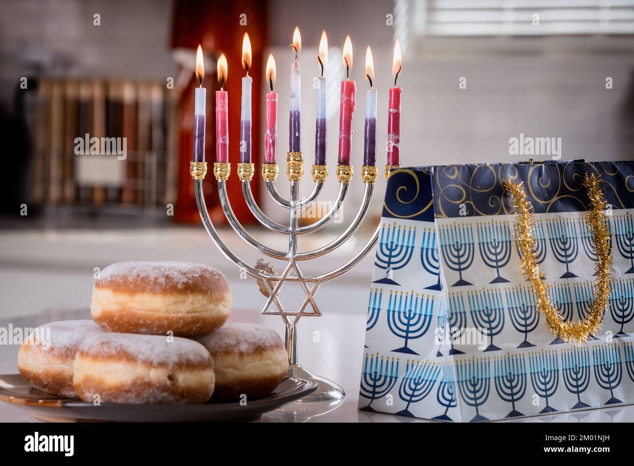 Jewish holiday Hanukkah with menorah traditional defocused lights with ...