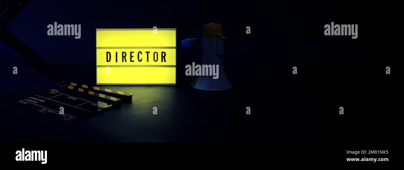 Director chair with cinema lightbox sign Director text on it and ...