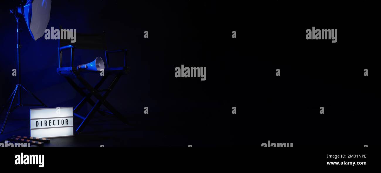 Director chair with cinema lightbox sign Director text on it and ...