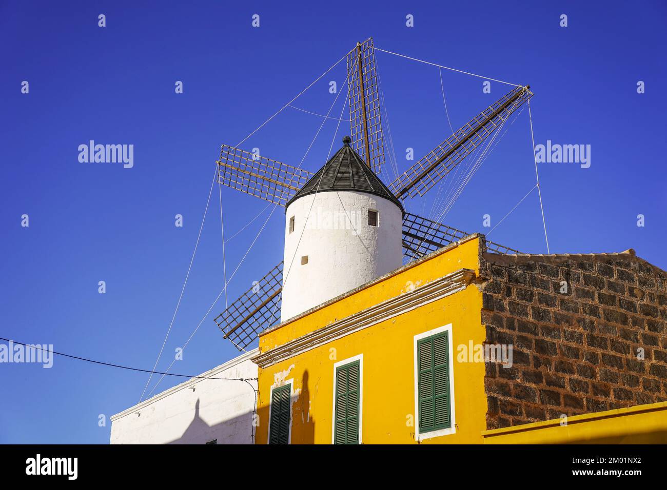 Old spanish windmill, housing bar restaurant in the spanish town of ...