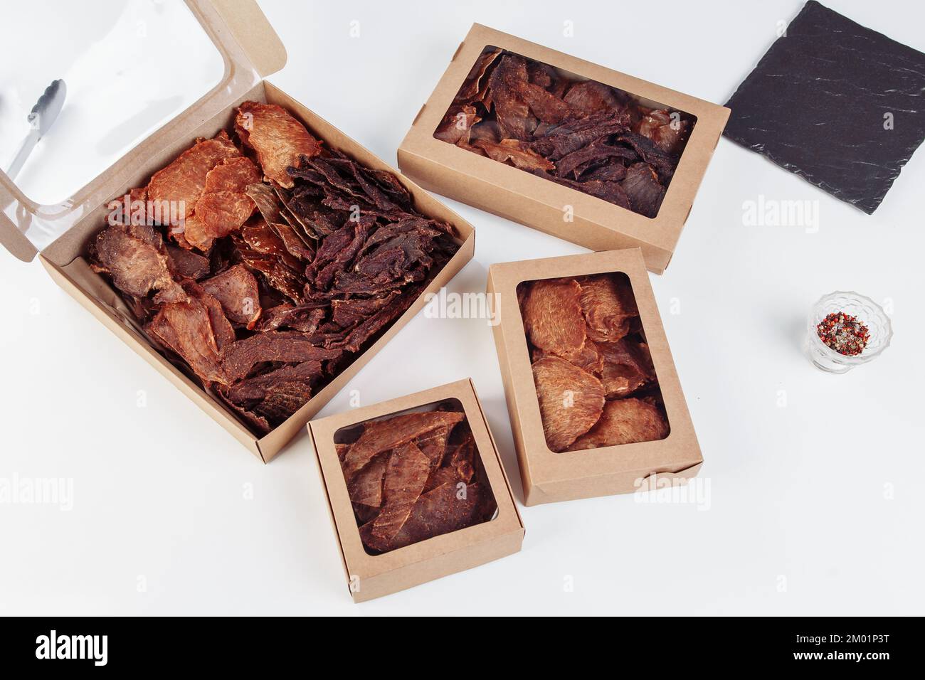 Beef jerky snack high in protein, lean meat. smoked, dried food. white ...