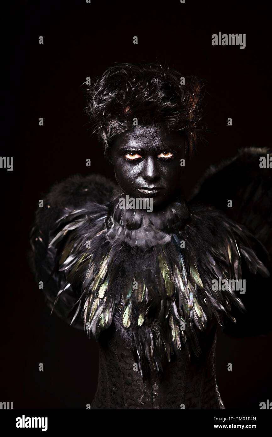 Woman with harpy makeup - mystical creature, isolated on black Stock ...