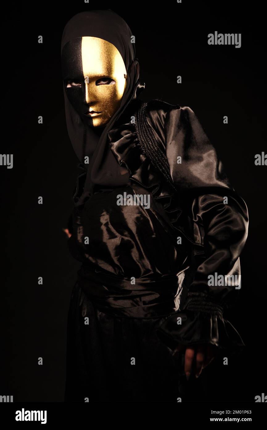 Close-up portrait of woman in mask. can be use for vampire concept ...