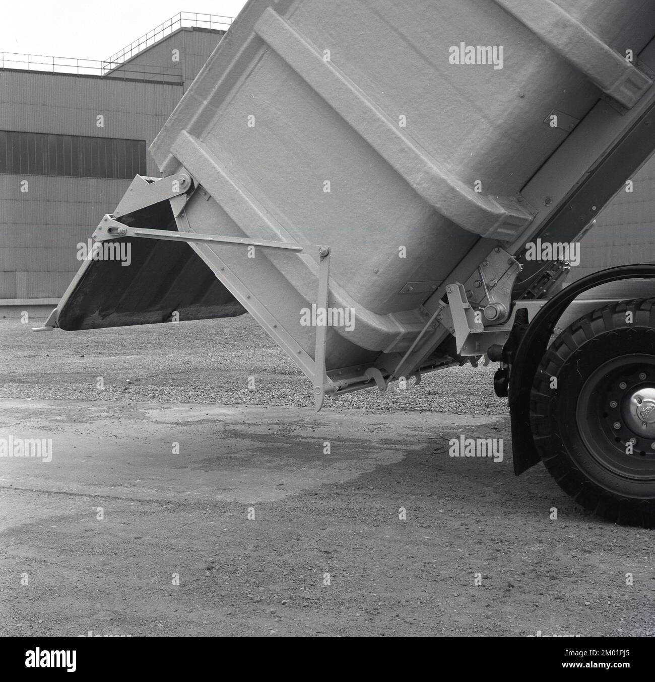 1950s, historical, outside at a steelworks, picture shows a new dump ...
