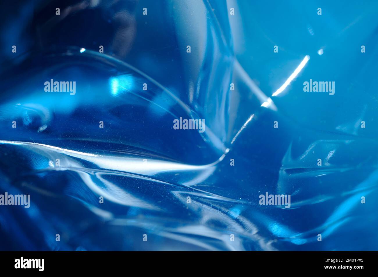 blue plastic bottle crumpled, abstract macro detail Stock Photo - Alamy