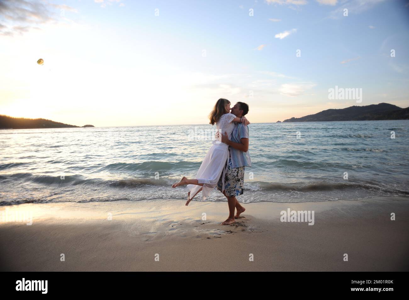 Young couple on Phuket Patong sand beach Stock Photo - Alamy