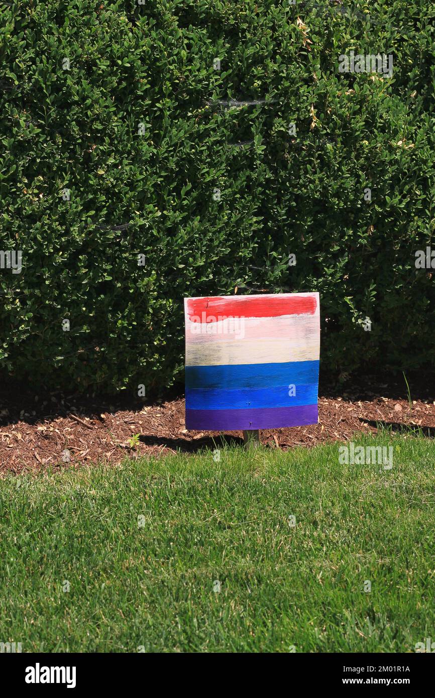 Striped yard sign banner in red,white, and blue colors Stock Photo - Alamy