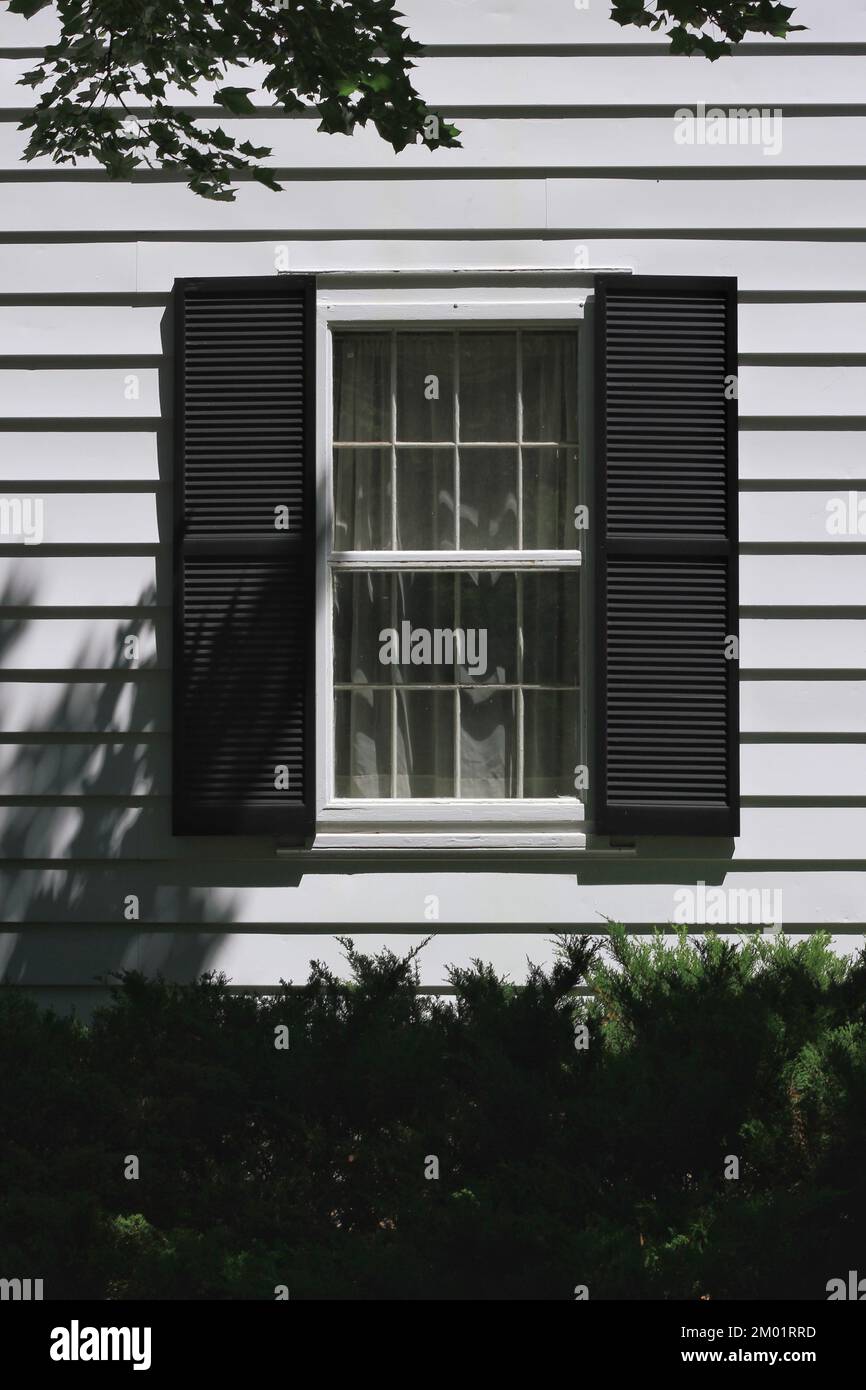 Traditional wooden cottage window on the wall of a house Stock Photo ...